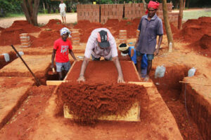 Stabilised Rammed Earth Foundations - Auroville Earth Institute