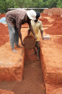 Stabilised Rammed Earth Foundations - Auroville Earth Institute